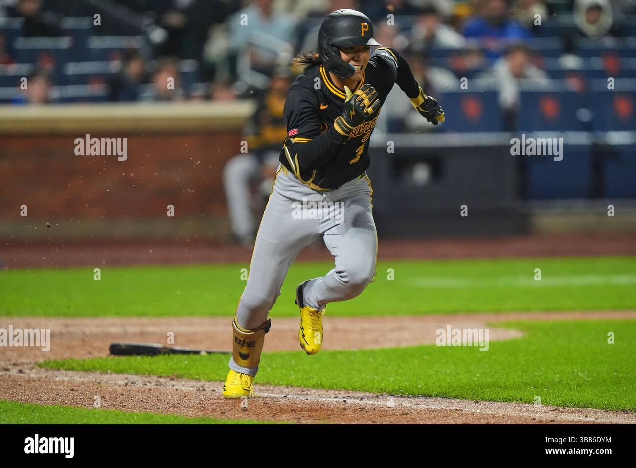 Pittsburgh Pirates' Ji Hwan Bae runs to first base after bunting for a ...
