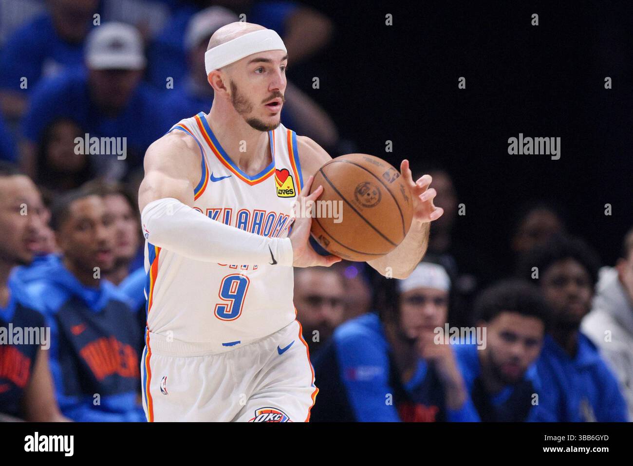 Oklahoma City Thunder guard Alex Caruso passes the ball in the first ...
