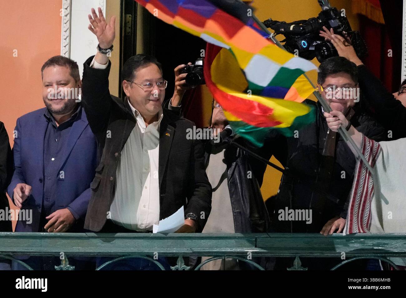 Bolivian President Luis Arce greets supporters after dropping out of ...