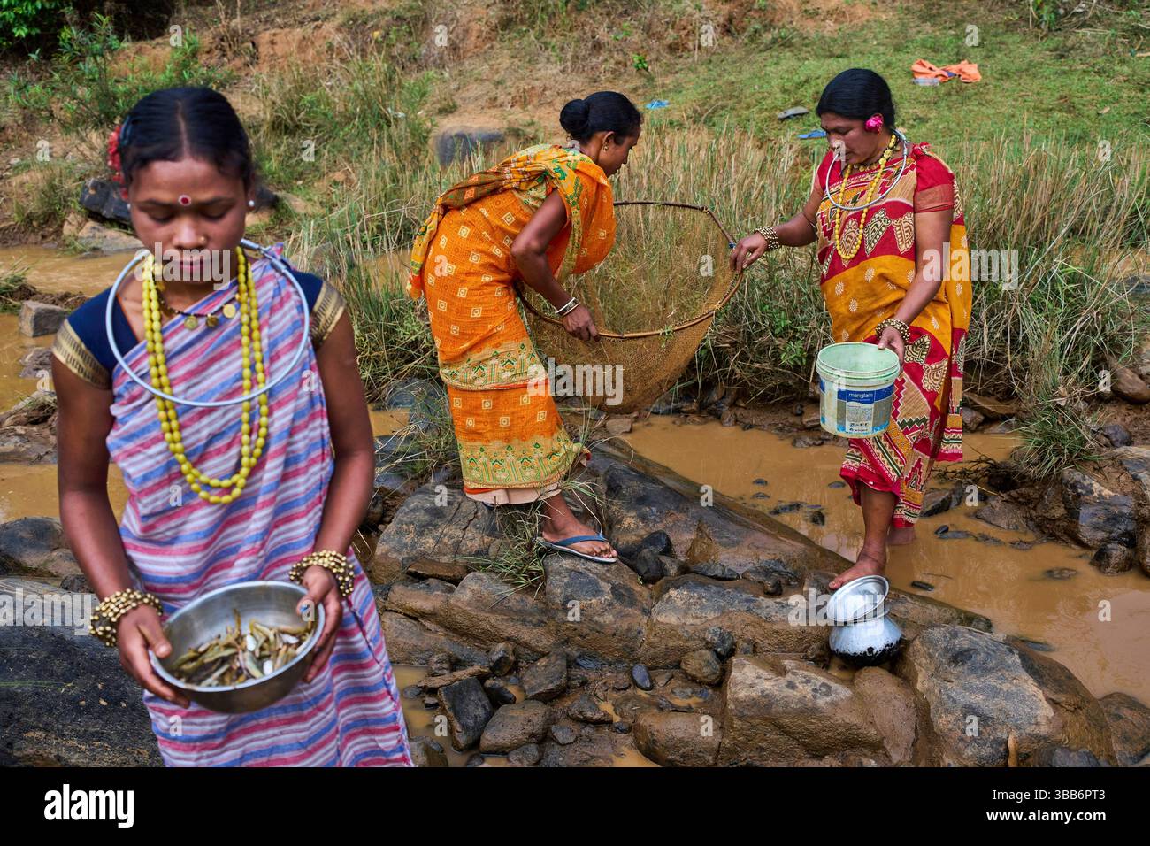 Sunita Muduli, right, from the Paroja Indigenous community, along with ...