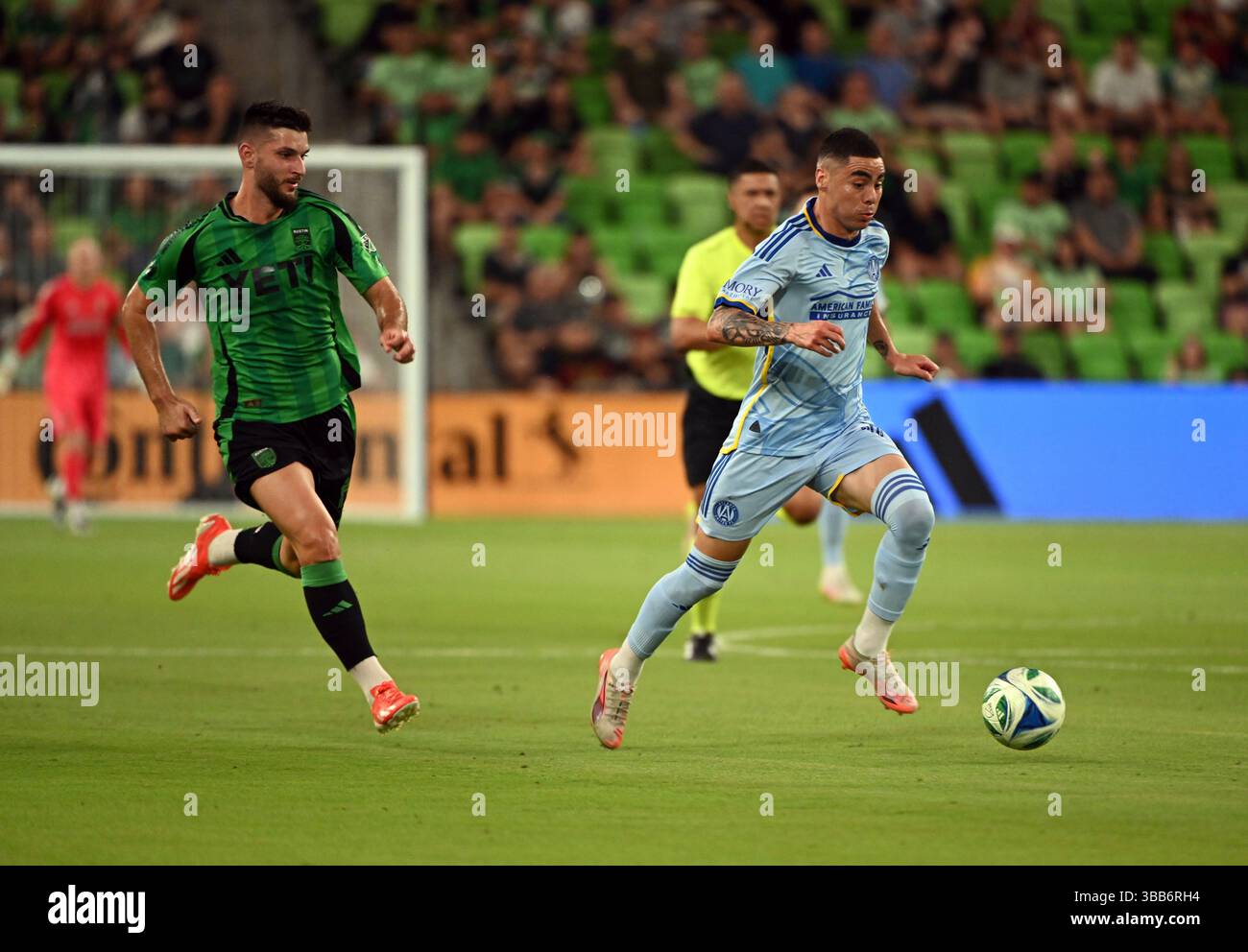 AUSTIN, TX - May 14: Atlanta United FC forward Miguel Almirón is chased ...