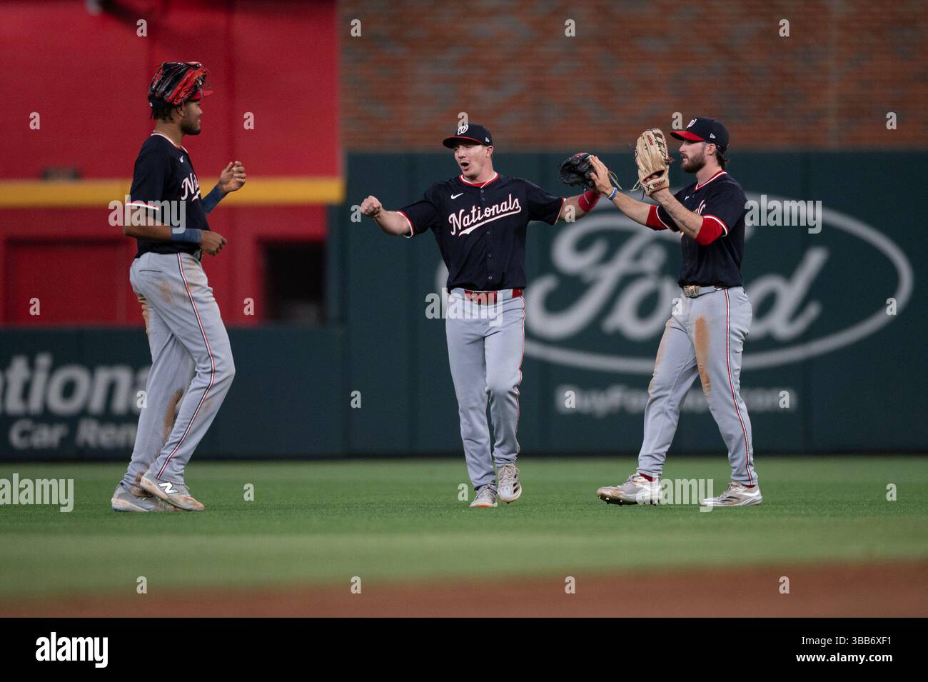 Washington Nationals' outfielders James Wood (left), Washington ...