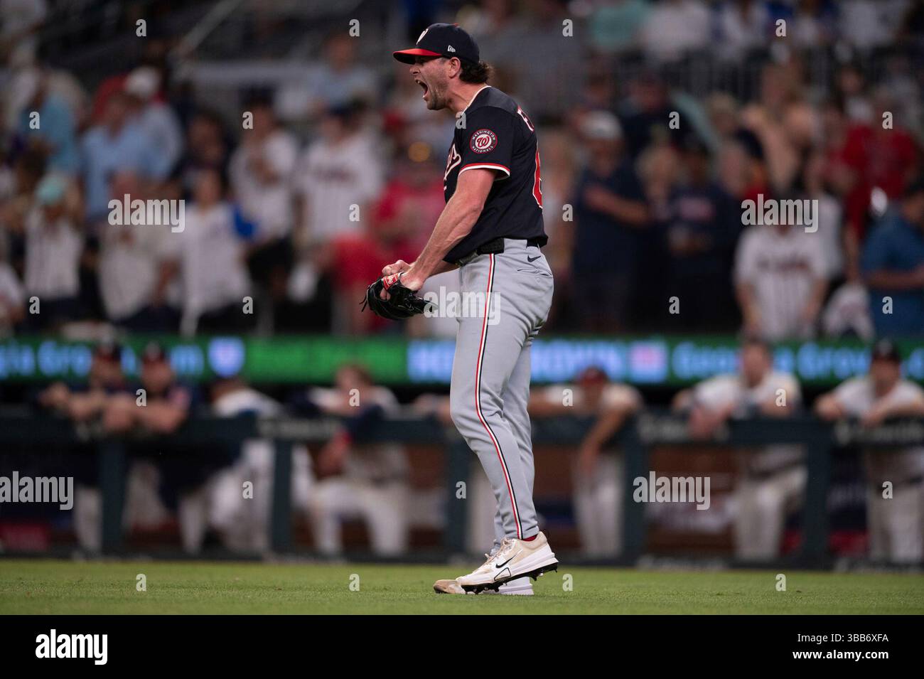 Washington Nationals pitcher Kyle Finnegan (67) reacts to the final out ...