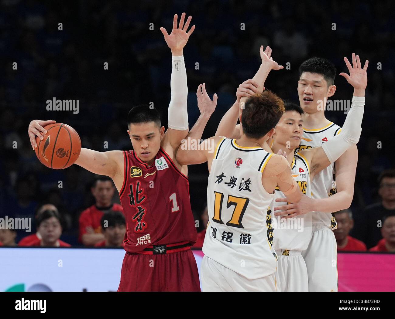Beijing, China. 14th May, 2025. Chen Yingjun (L) of Beijing Ducks and ...