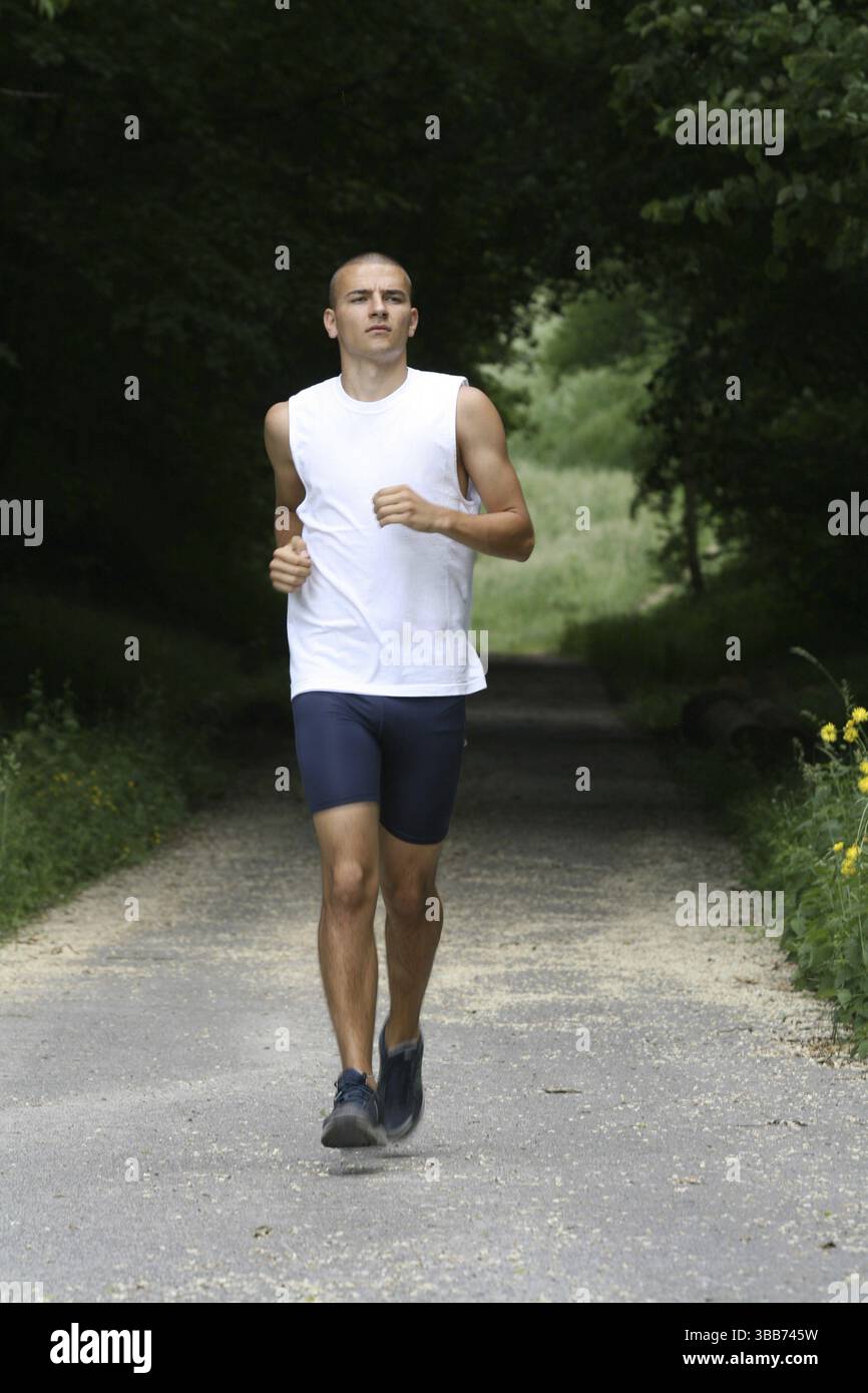 A running man on a road, Coburg Stock Photo - Alamy
