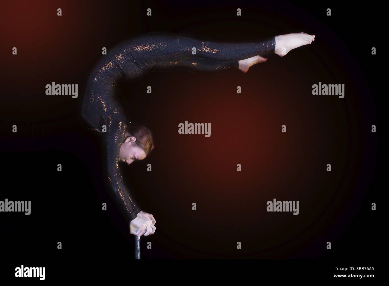 Acrobatic and gymnastic poses in front of black background Stock Photo ...