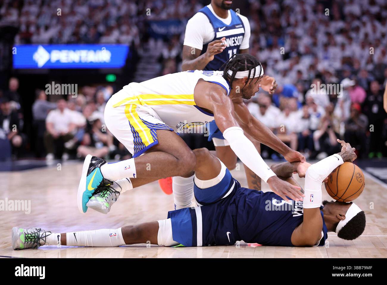 Golden State Warriors' Buddy Hield fouls Minnesota Timberwolves' Jaden ...