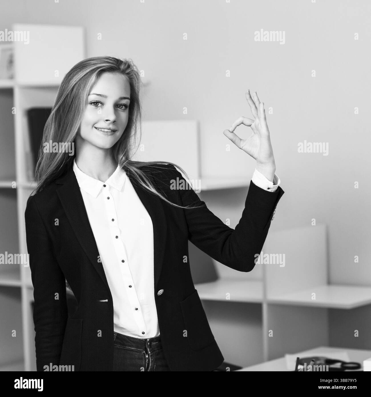 Young smiling woman blue Black and White Stock Photos & Images - Alamy