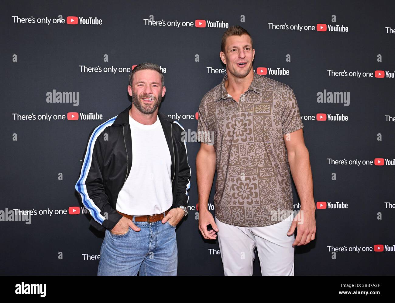 Former NFL players Julian Edelman, left, and Rob Gronkowski attend the ...