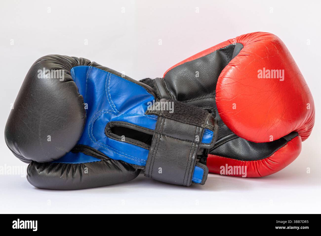 10 oz and 8 oz red and blue boxing gloves on white backgroung Stock ...