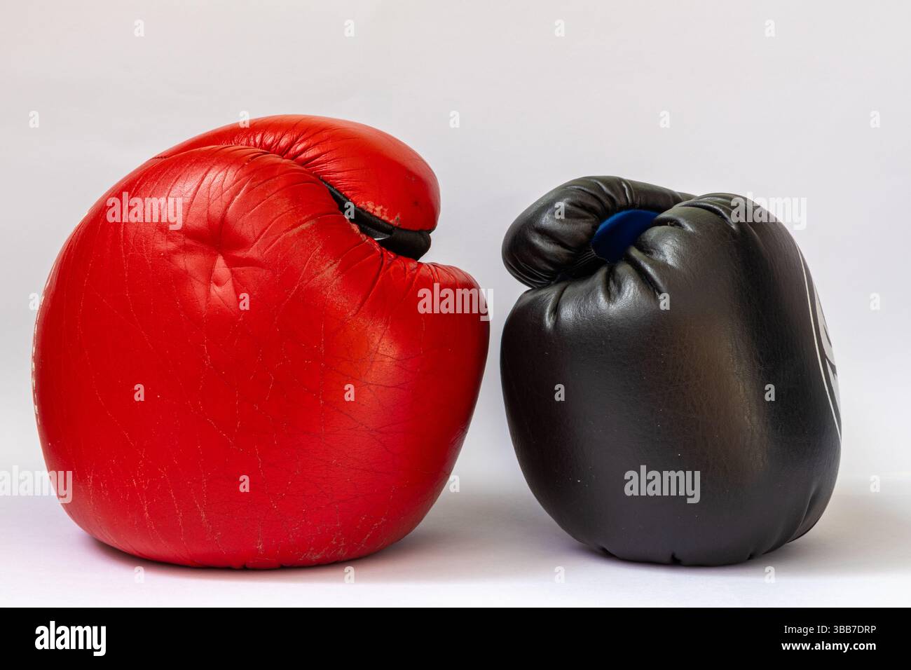10 oz and 8 oz red and black boxing gloves on white backgroung Stock ...