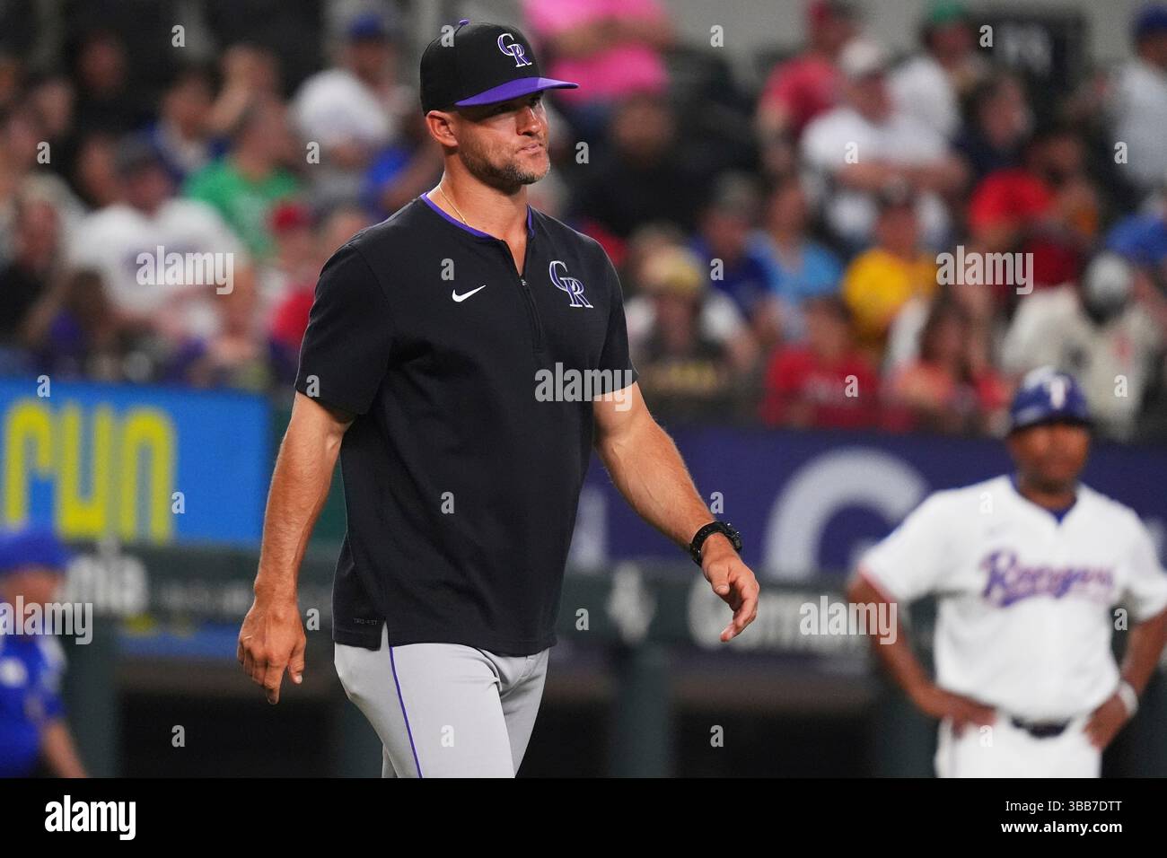 Colorado Rockies interim manager Warren Schaeffer walks onto the field ...