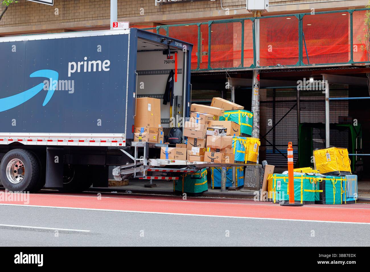 Home, residential packages on the back of an Amazon truck to be ...