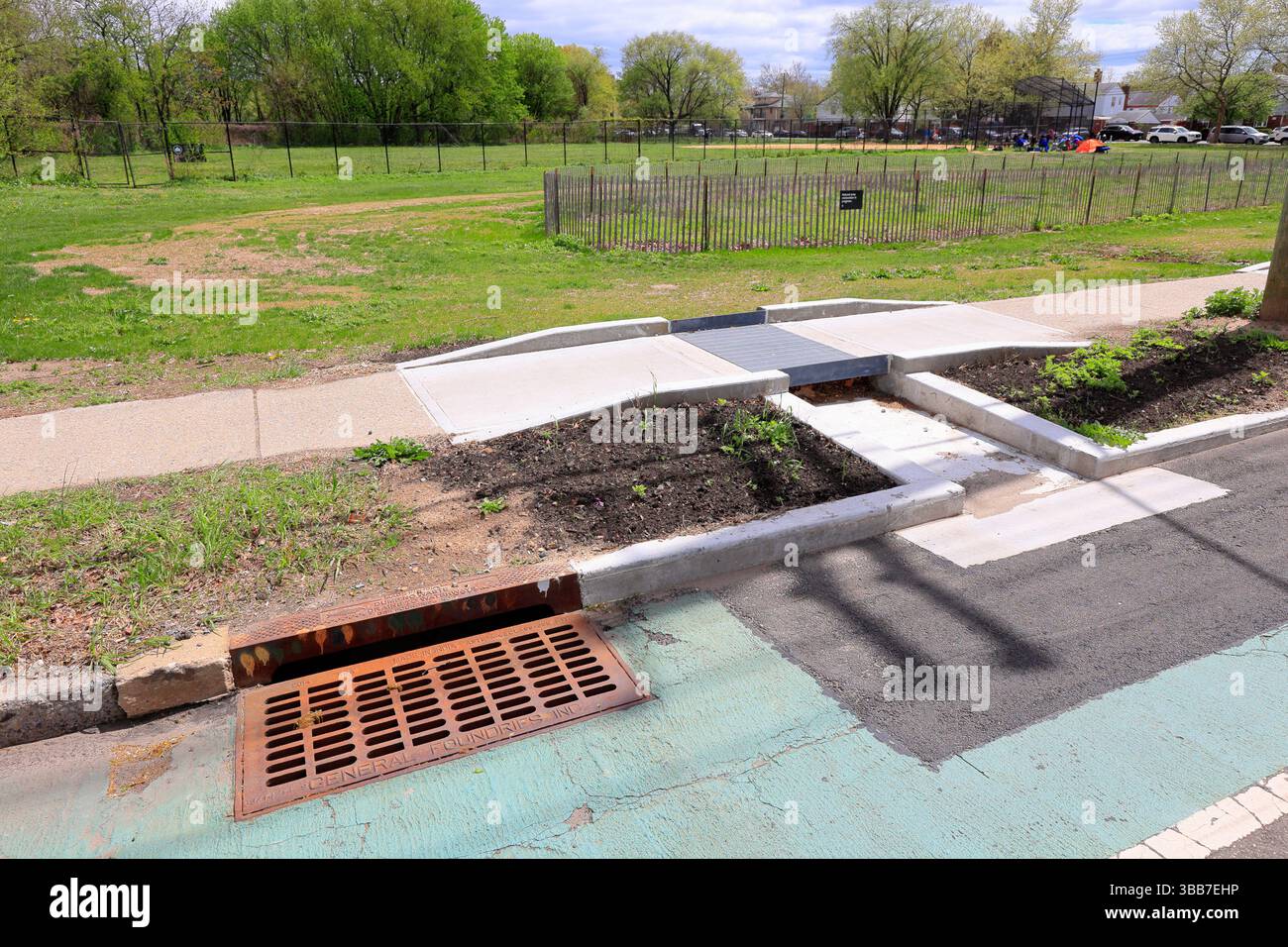 A stormwater conveyance channel located next to a storm drain at ...