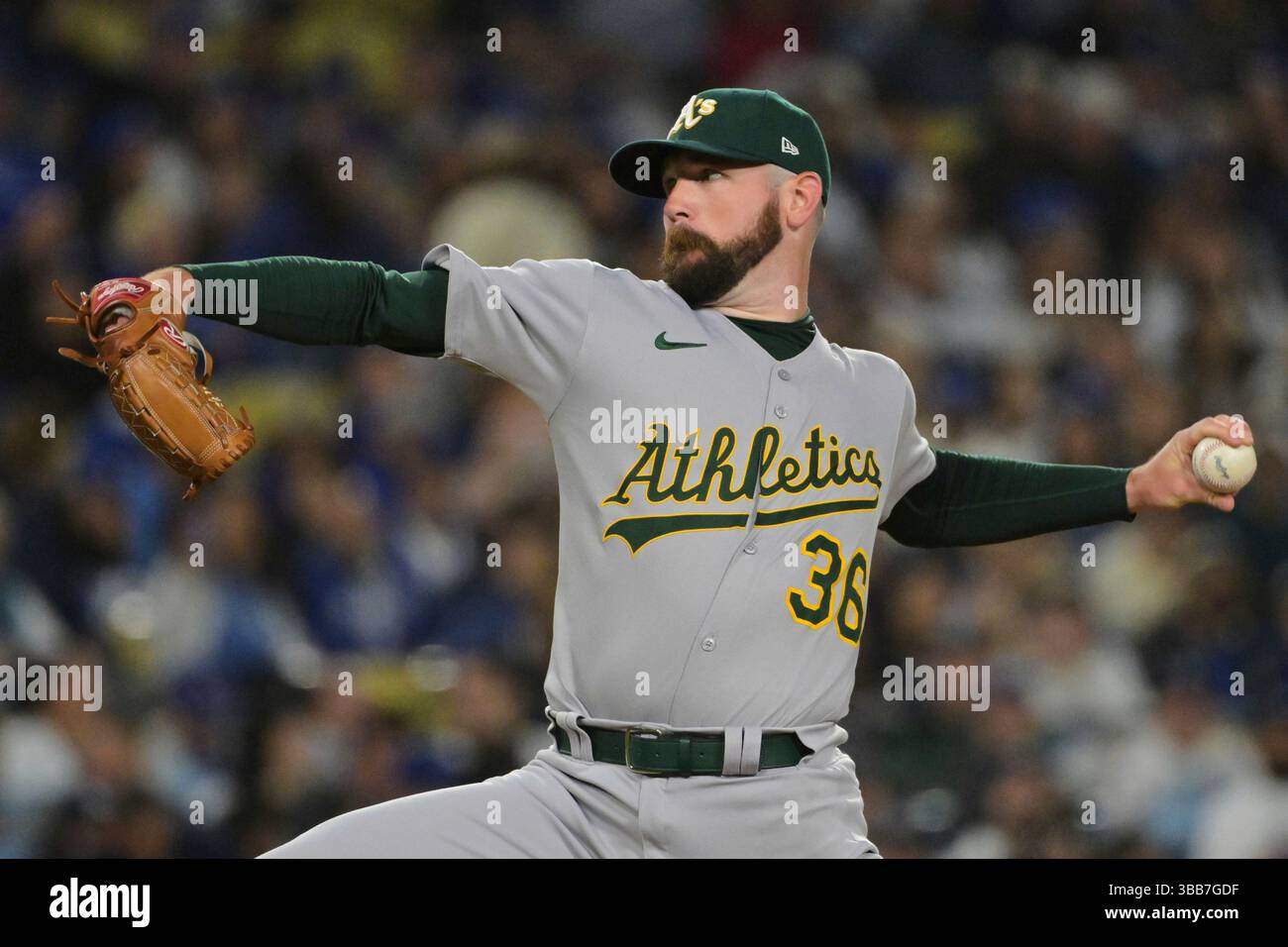 Oakland Athletics relief pitcher Hogan Harris throws to the Los Angeles ...