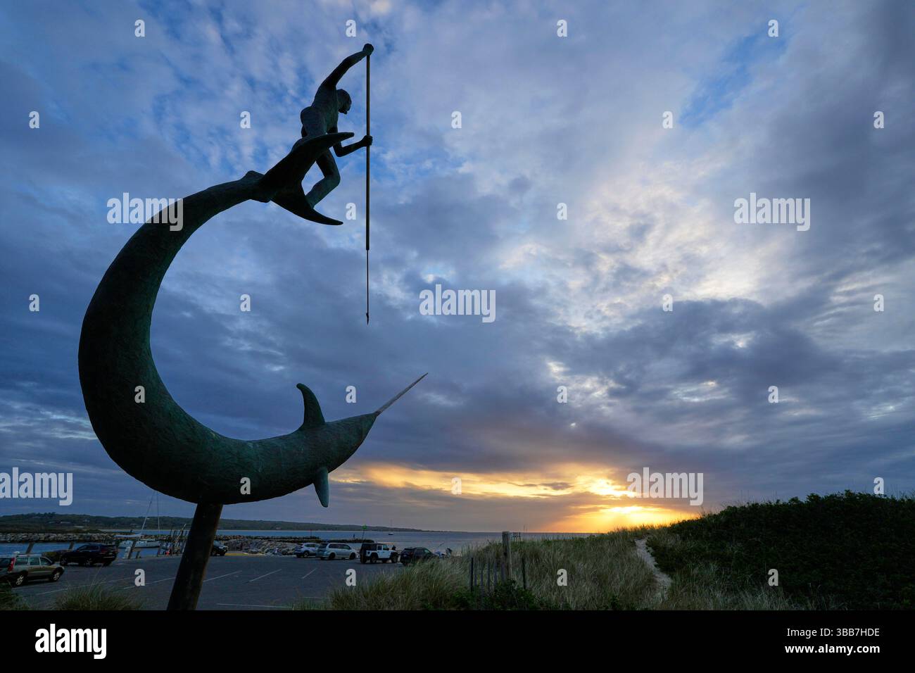 A sculpture of a fishermen harpooning a swordfish stands near Menemsha ...