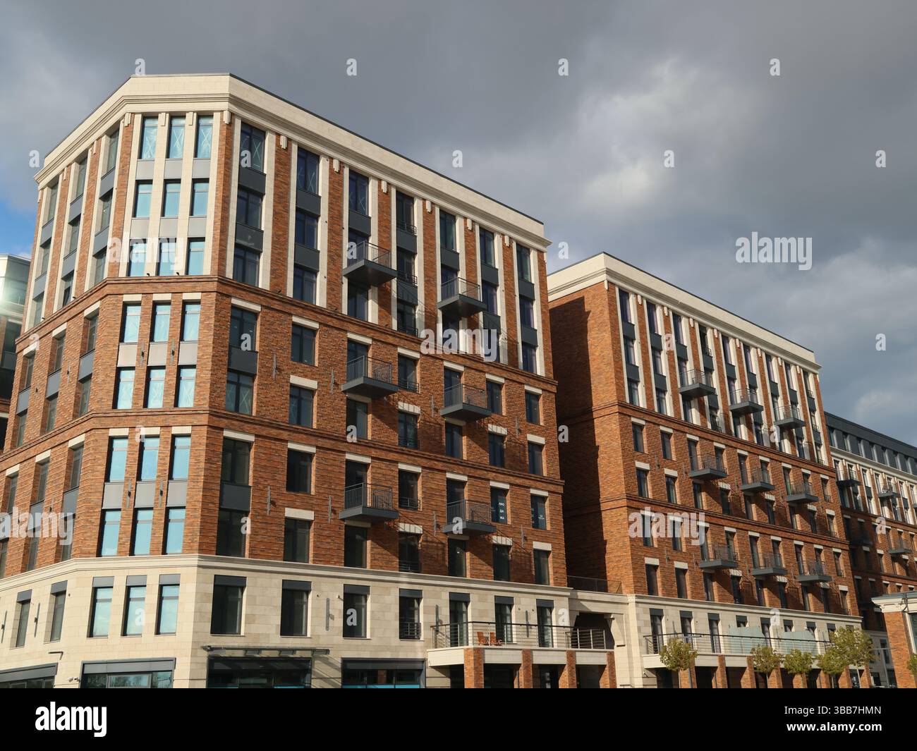This modern apartment complex features distinctive architecture that ...