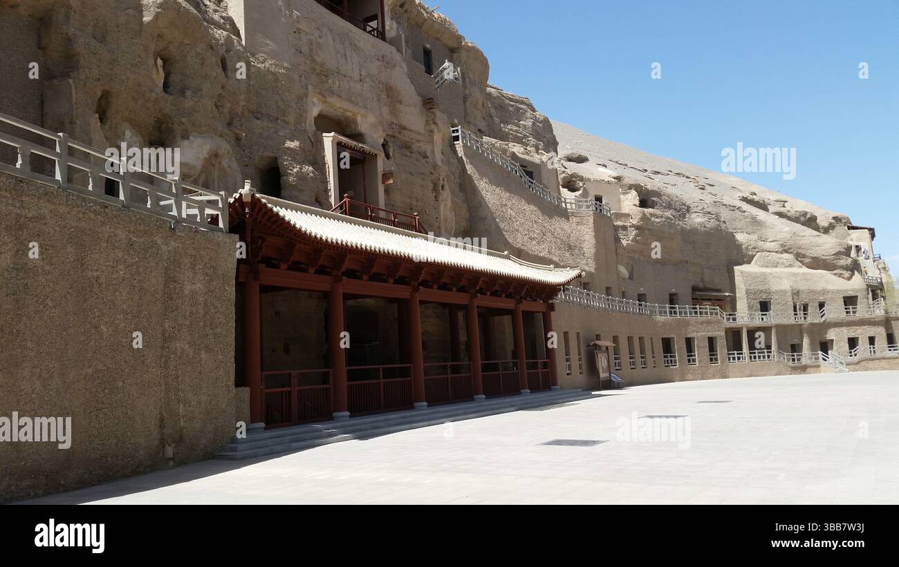 Mogao Caves of Dunhuang: Buddhist Art Amidst the Gobi Desert and Singing Sand Dunes Stock Photo ...