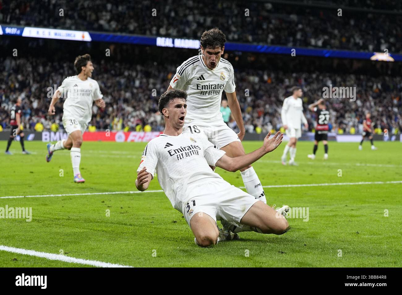 Jacobo Ramon of Real Madrid celebrates a goal 2-1 with Jesus Vallejo ...
