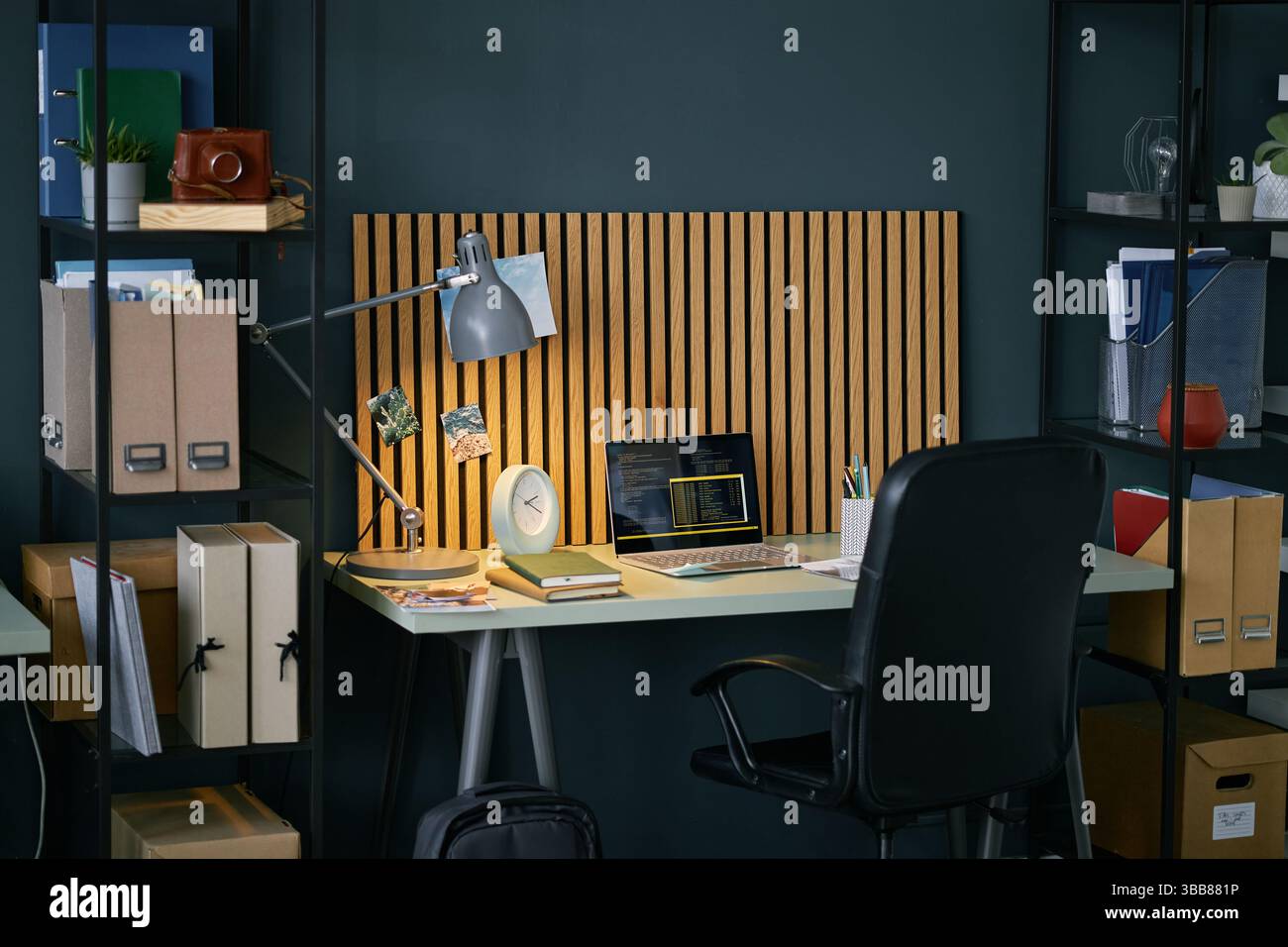 Neatly organized home office featuring wooden desk with computer setup ...