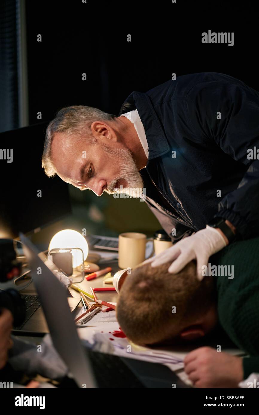 Scene depicting medical professional assisting unconscious person ...