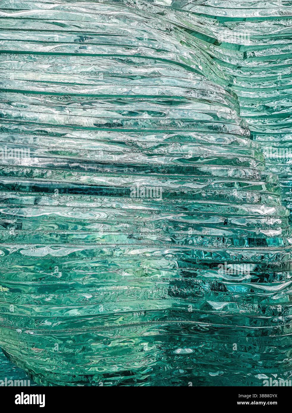 Layered glass texture showcases intricate patterns and reflections in vibrant colors. High ...