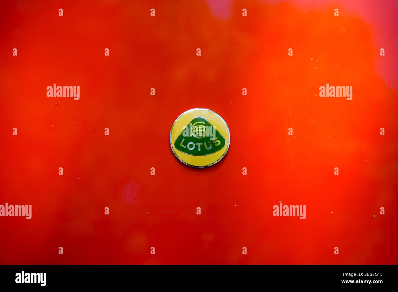 Germany Berlin May 11, 2025. Lotus emblem on red paint. The iconic ...