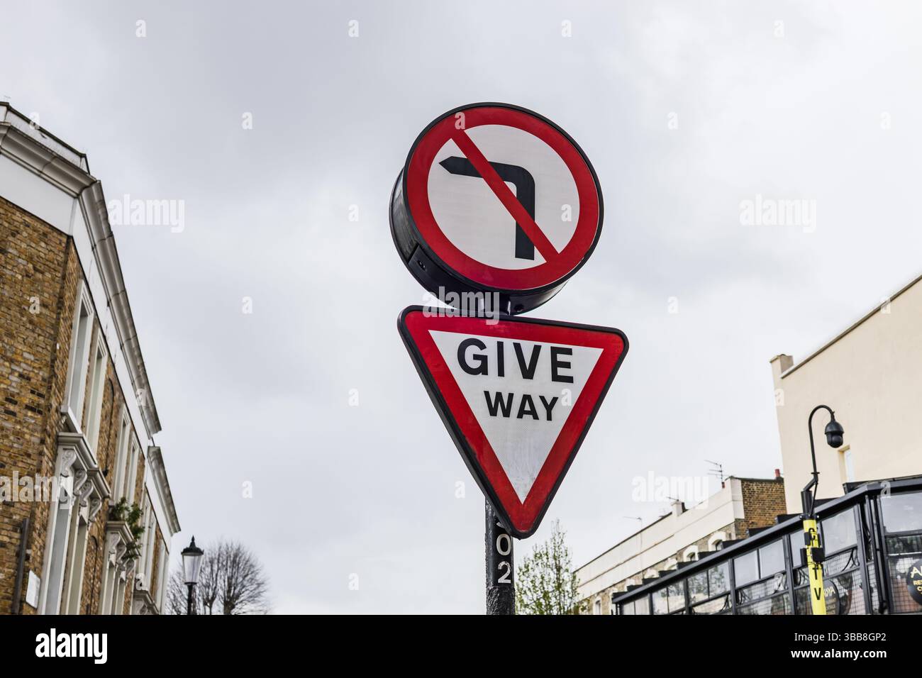 Give Way Traffic Sign on Urban Street Corner Guiding Drivers for Safe ...