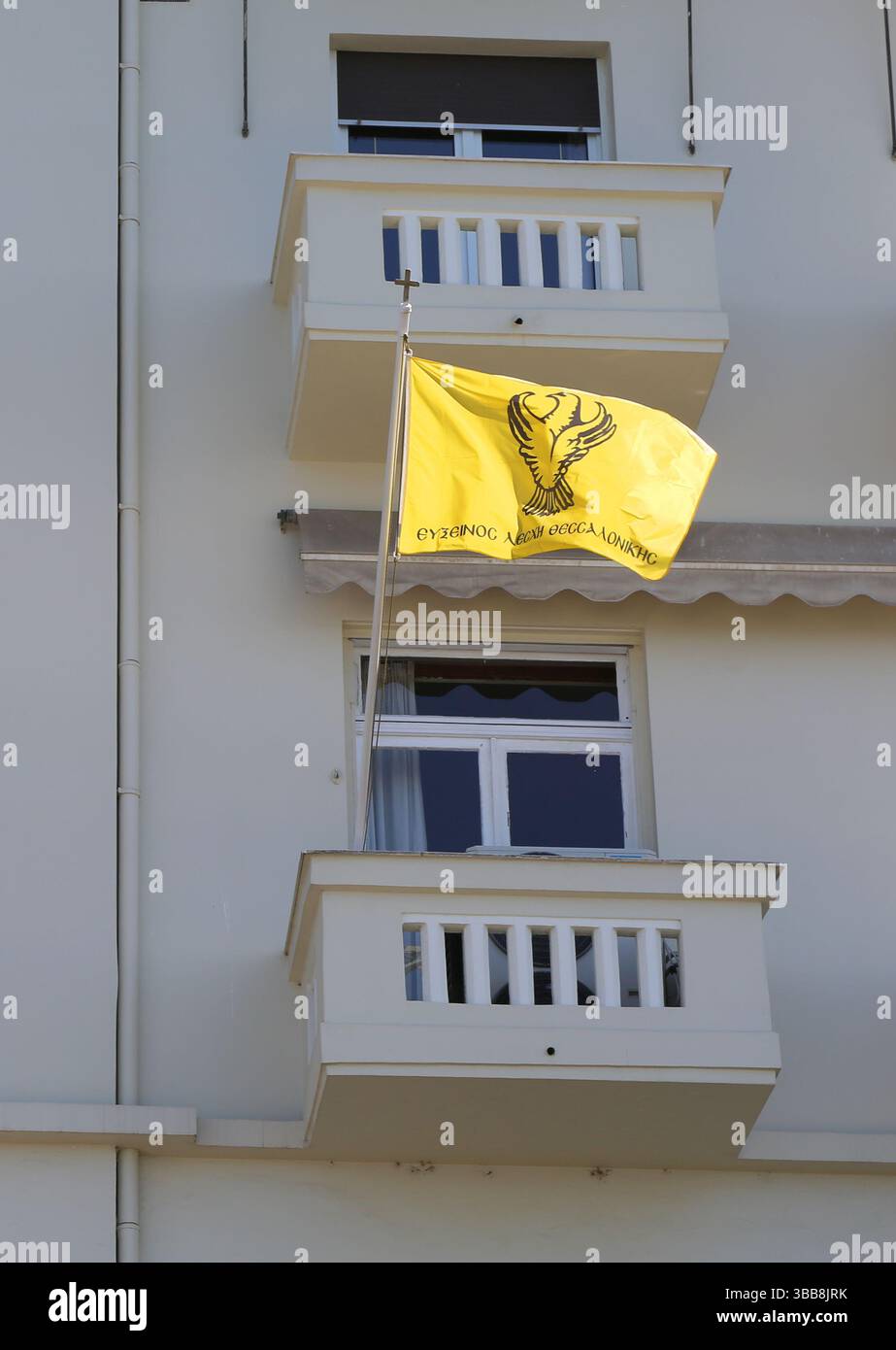 Greek Orthodox Church Flag with Cross Flying in the air in Thessaloniki ...