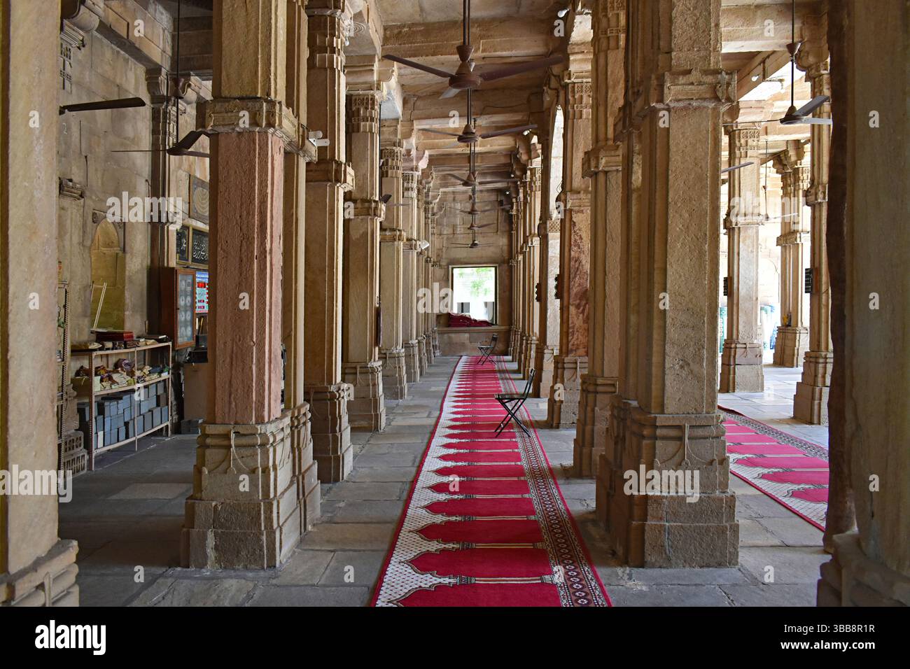 Interior of Saiyad Usman Mosque, featuring intricately carved stone ...