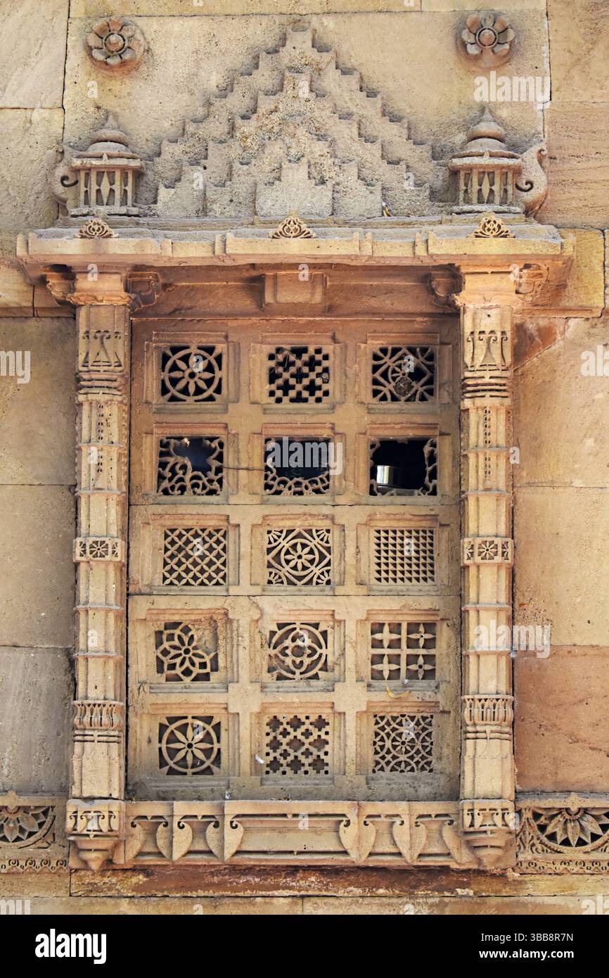 Detailed stone carvings on a window of Saiyad Usman Mosque, an Islamic ...