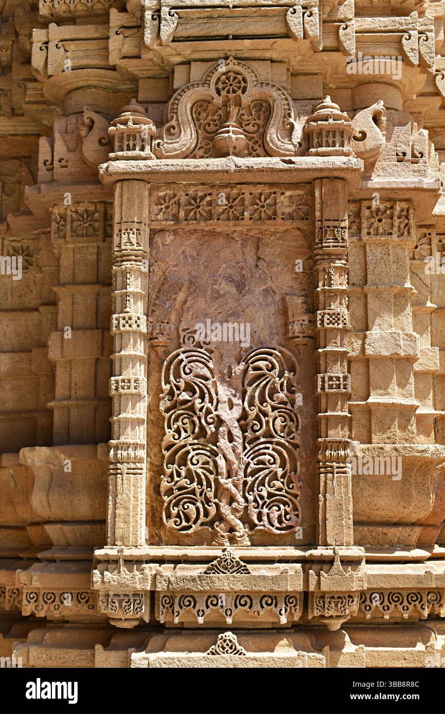 Detailed stone carvings on a minaret of the Saiyad Usman Mosque, a ...