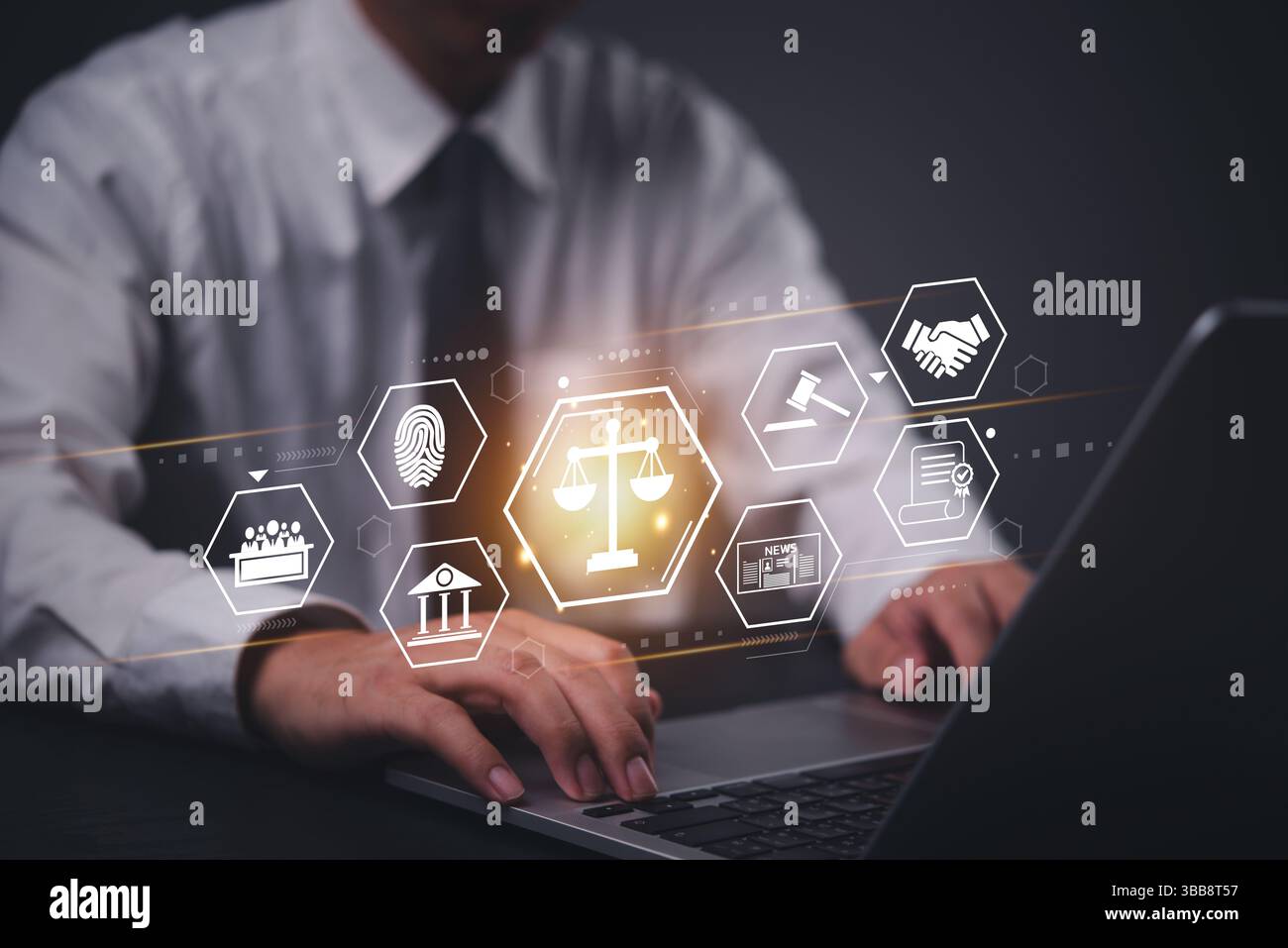 Businessman working laptop with a futuristic legal technology interface ...