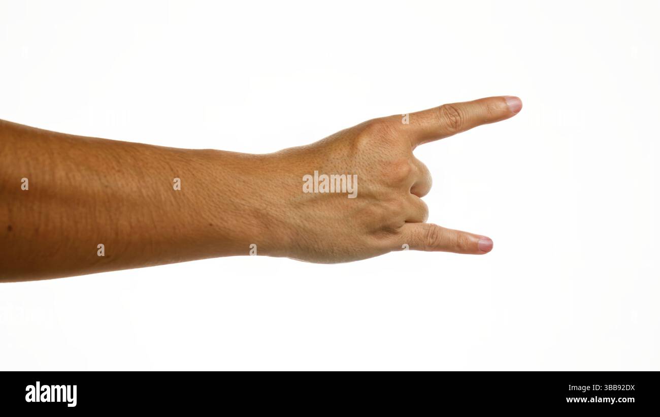 Hand making a rock gesture with fingers extended on an isolated white ...