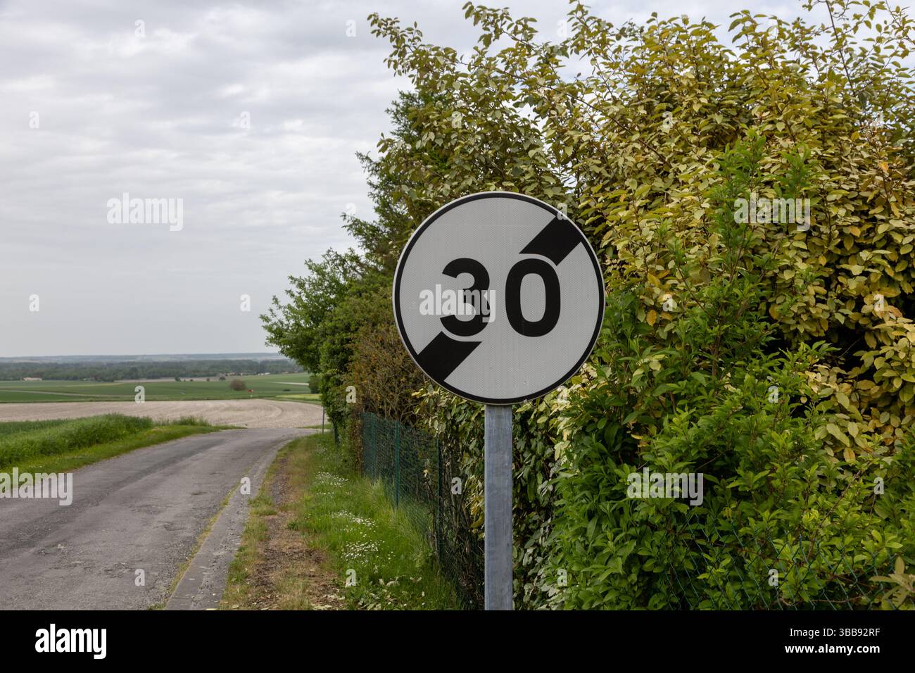 traffic sign: end of speed limit in urban areas Stock Photo - Alamy