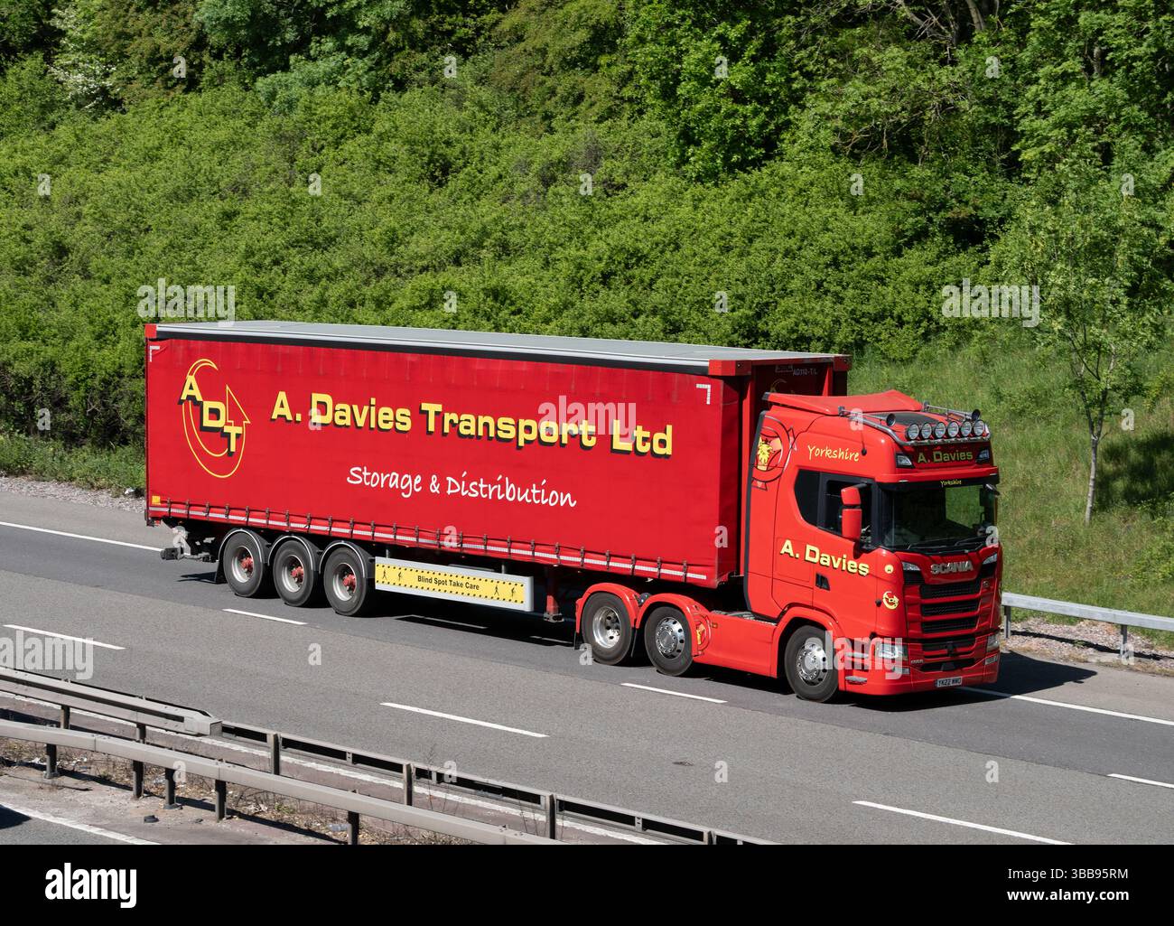 A Davies Transport Scania lorry on the M40 motorway, Warwickshire, UK ...