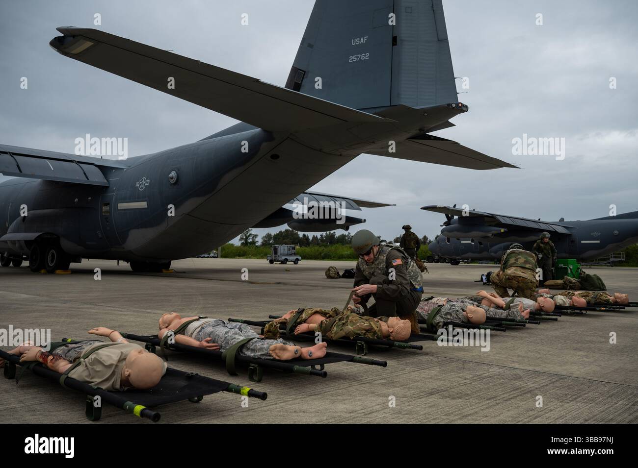 U.S. Air Force Tech. Sgt. Michael Ryan, left, 18th Aeromedical ...