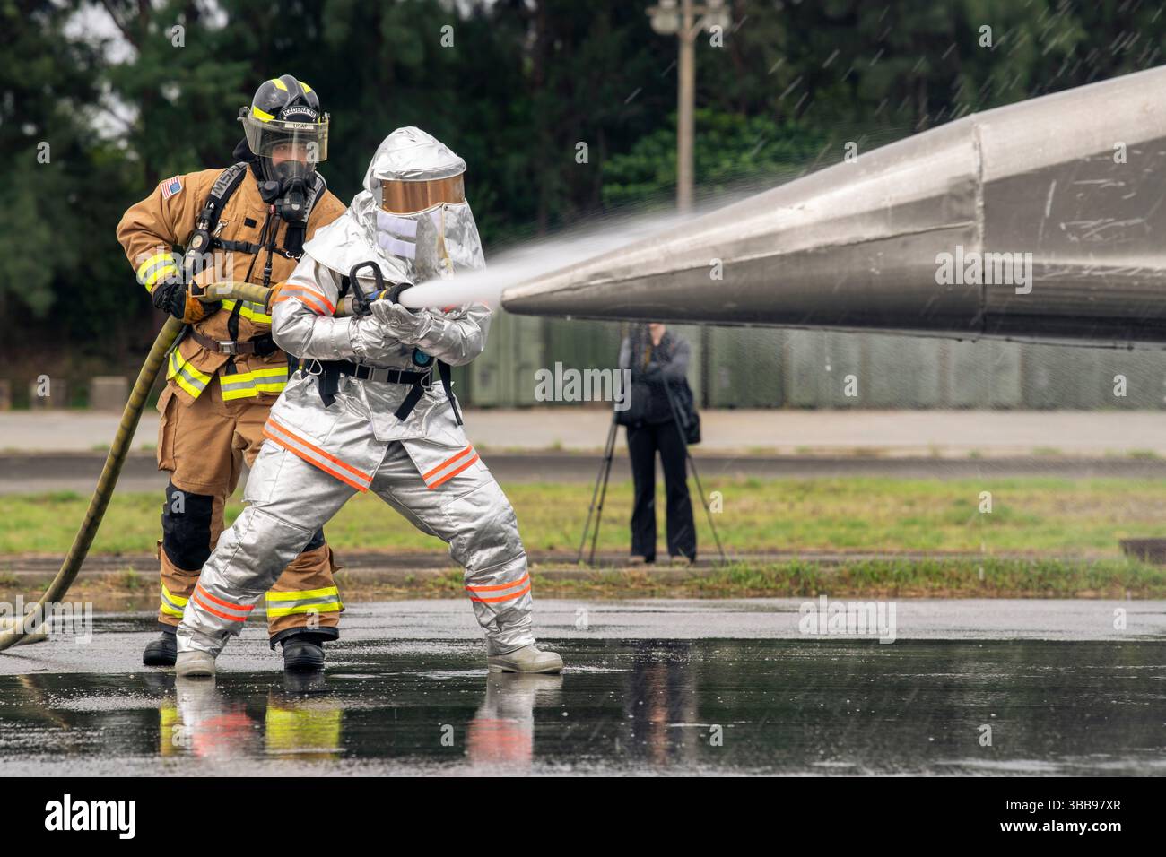 A U.S. Air Force firefighter assigned to the 18th Civil Engineer ...