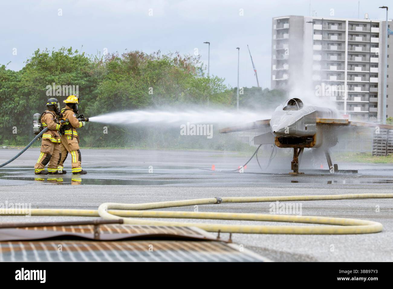 A U.S. Air Force firefighter assigned to the 18th Civil Engineer ...