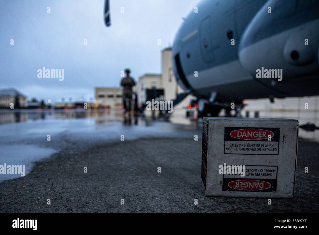 A cartridge of countermeasure flares sits on the flightline during ...