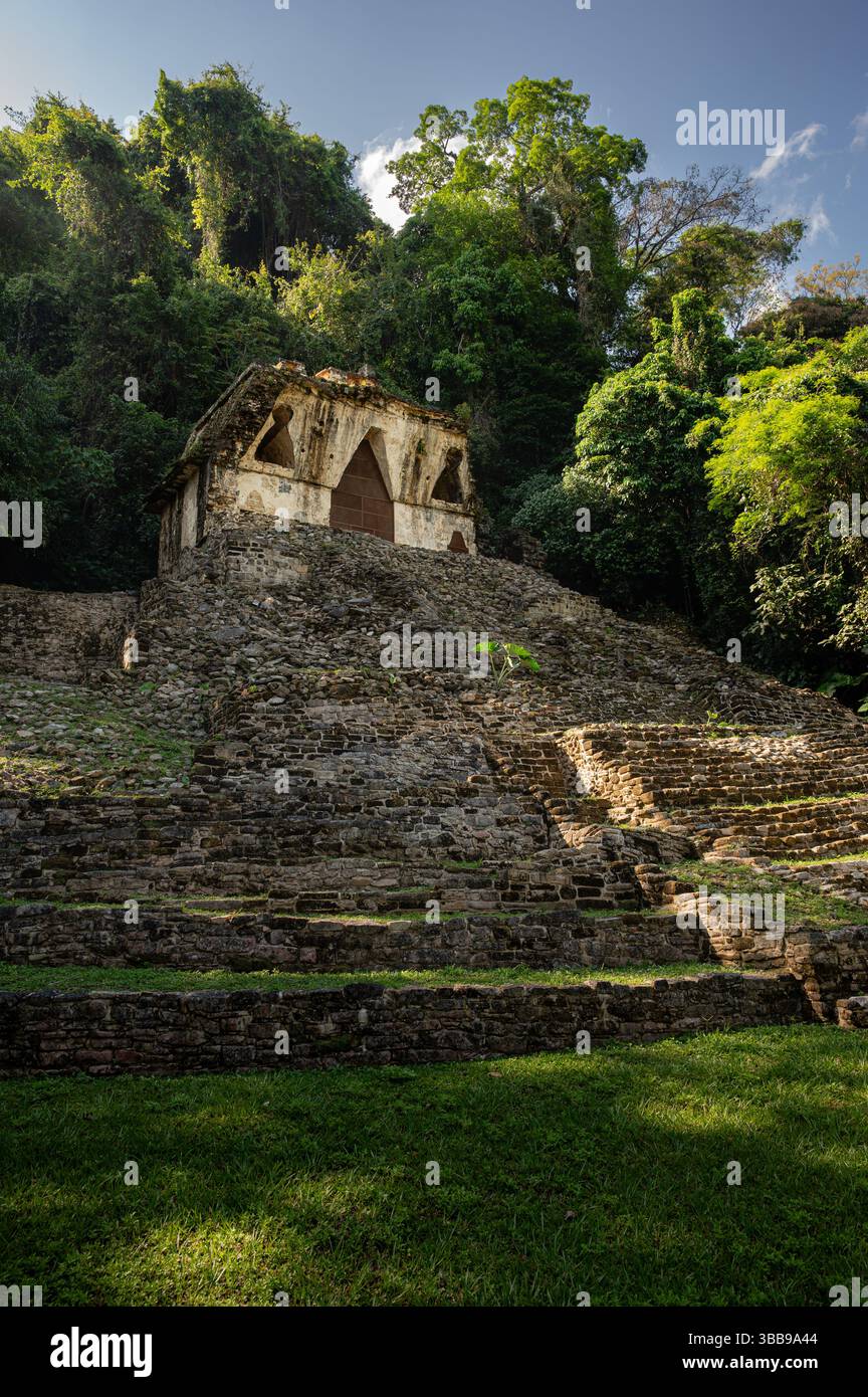Low angle view of the Mayan temple of the cross at Palenque, Chiapas ...