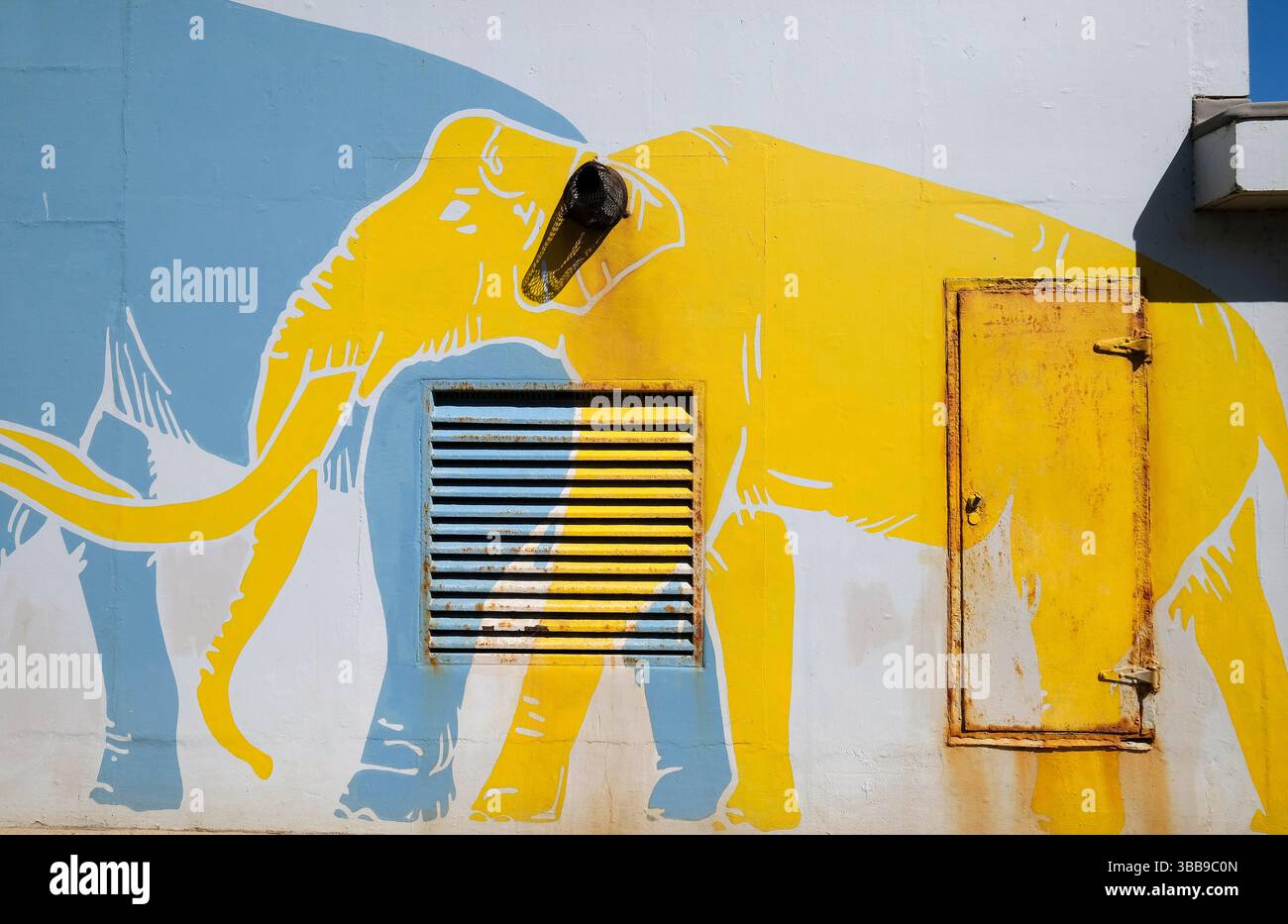 yellow mammoth elephant painted on building wall, sheringham, north ...