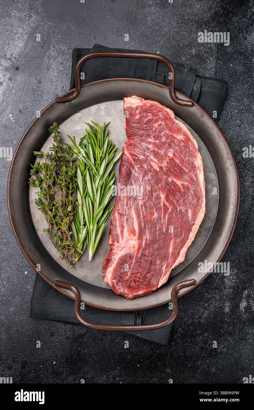 Prime raw top sirloin steak, highlighting its juicy texture and natural ...