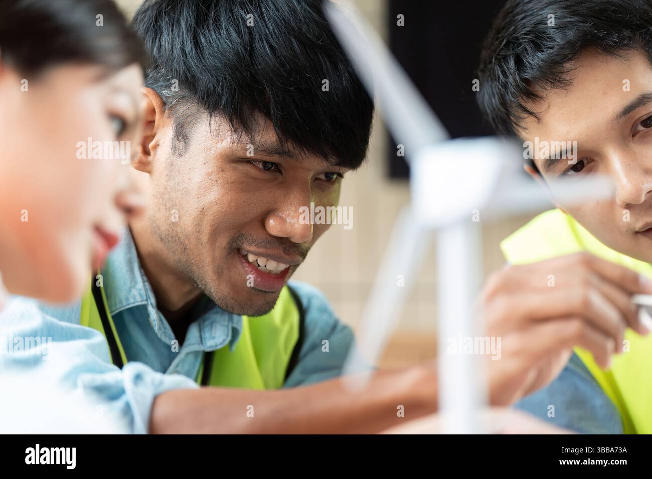 Sustainable Energy Planning. Team brainstorming innovative wind power ...