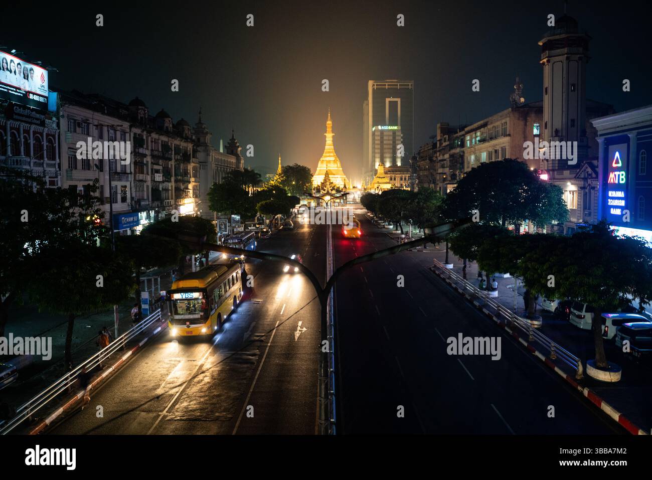 Yangon, Myanmar - 6 April, 2025: A view of the iconic Sule Pagoda, a historic Buddhist stupa ...