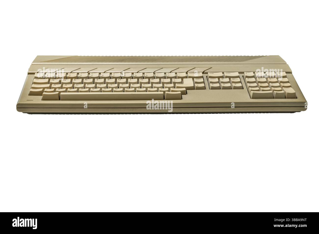 Antique computer from the 1990s on a white background, a museum piece ...