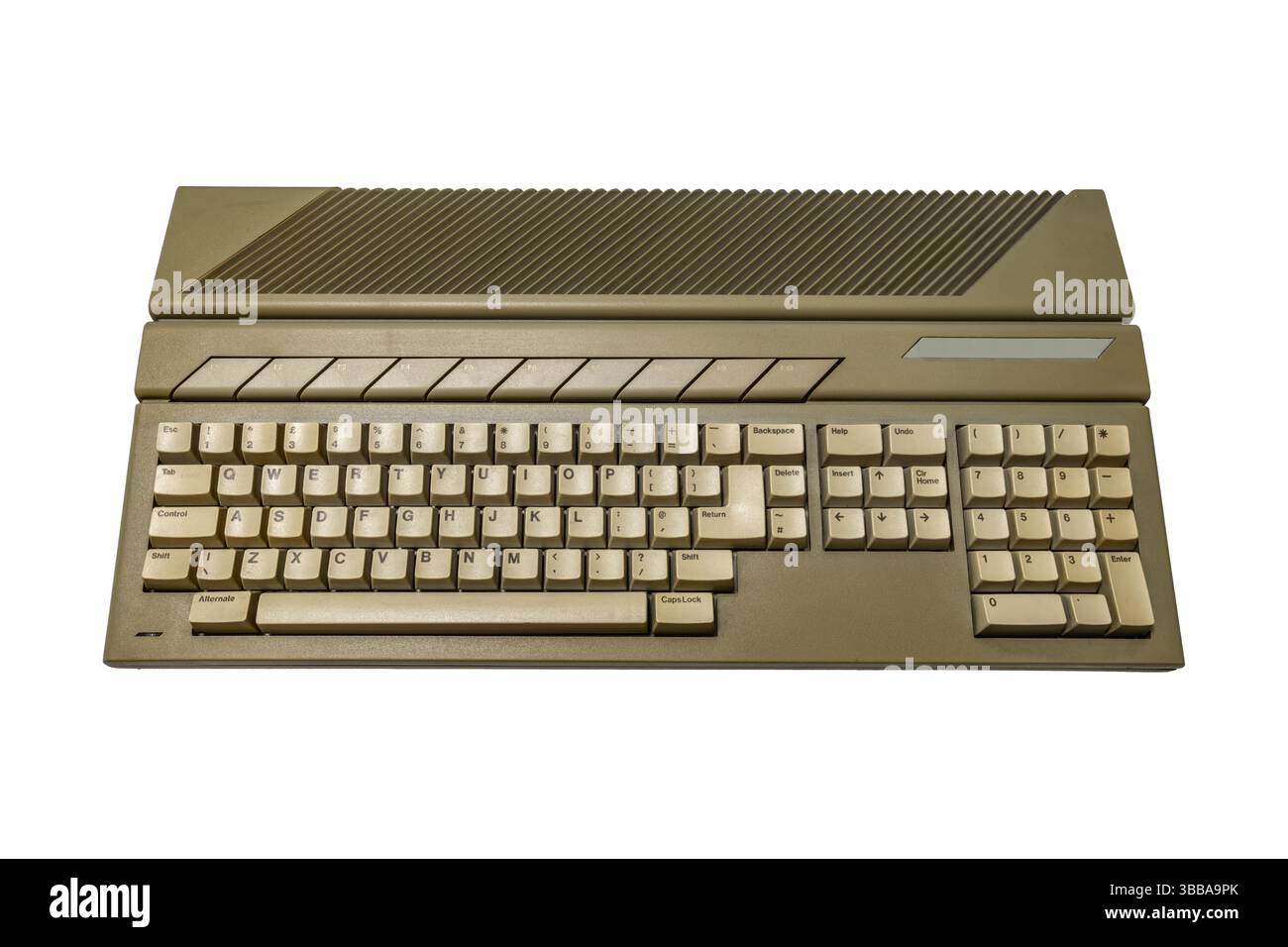 Antique computer from the 1990s on a white background, a museum piece ...