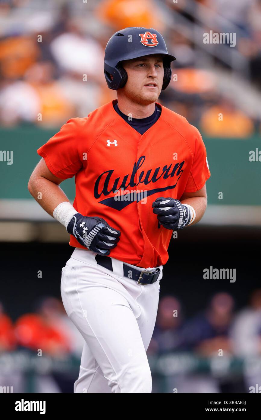 Auburn Tigers right fielder Ike Irish (18) hustles to first base ...
