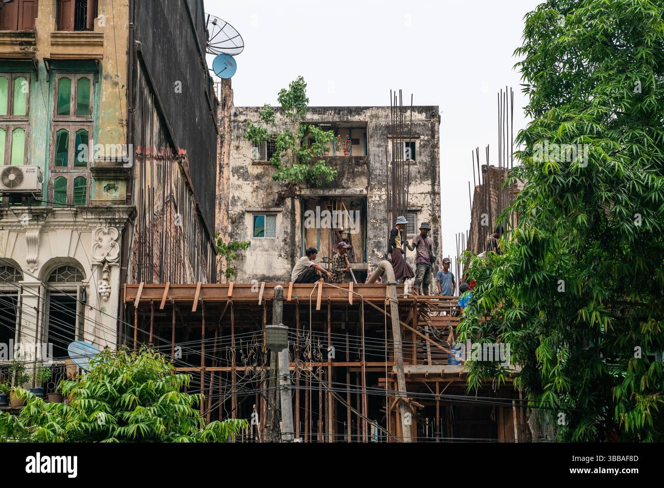 Yangon, Myanmar - 6 April, 2025: A typical street scene showing daily life and local activity in ...