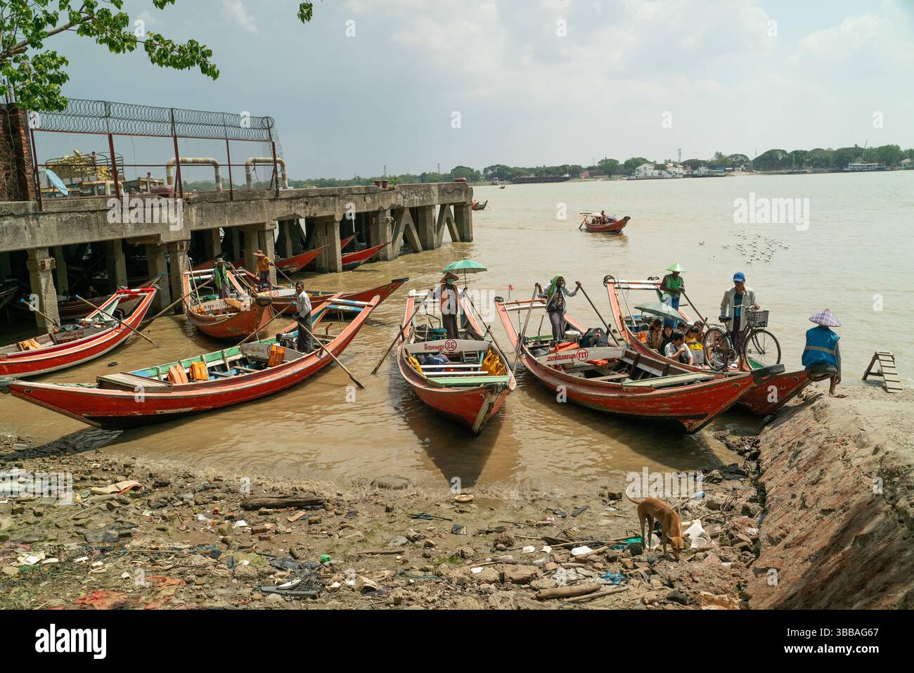 Yangon, Myanmar - 6 April, 2025: Various large and small boats are ...
